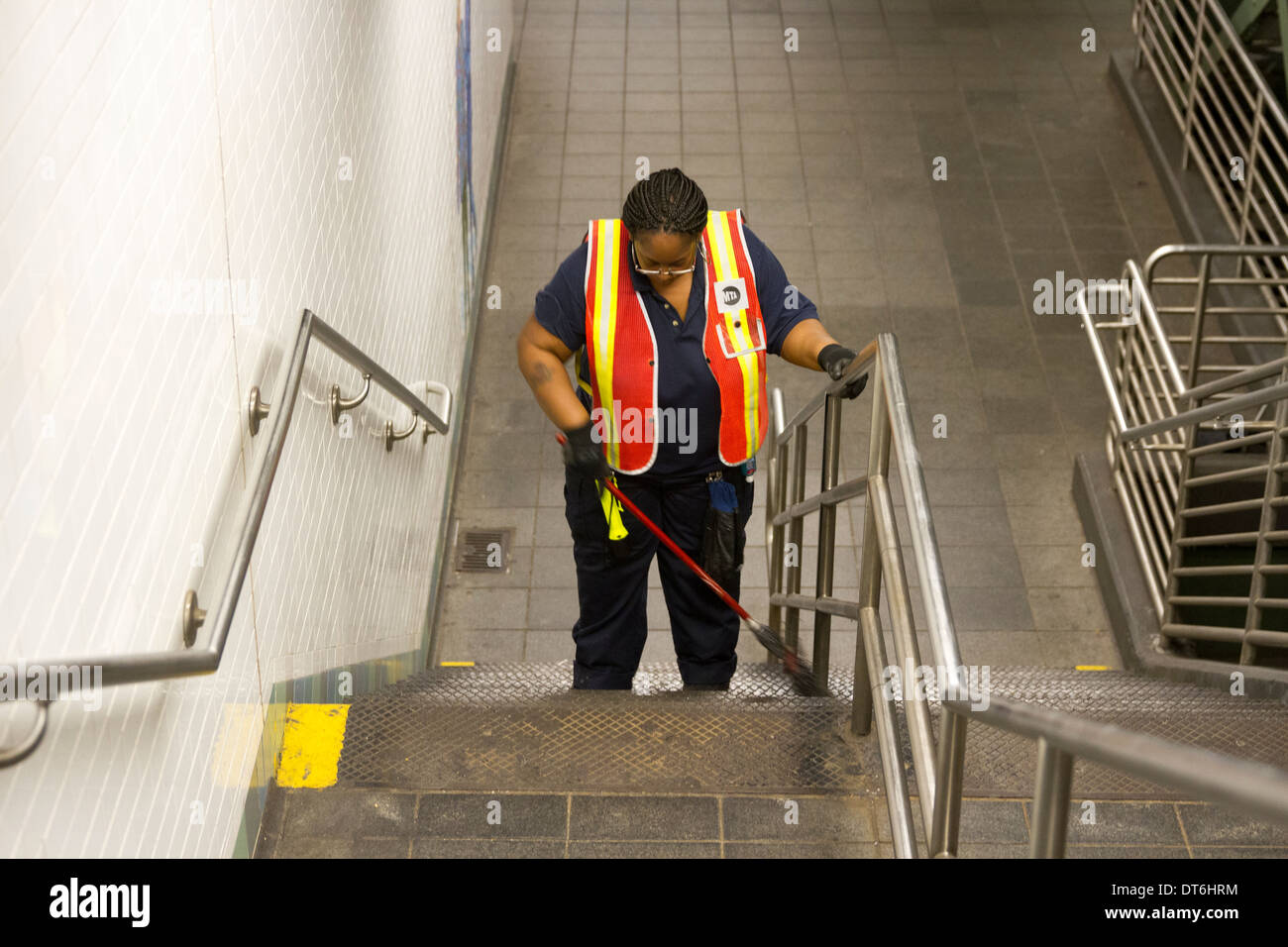 Women Cleaning inside the train station Stock Photo - Alamy
