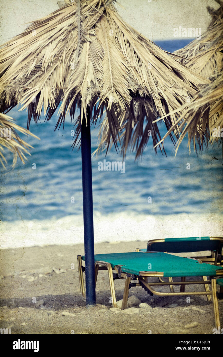 Vintage umbrellas on beach hi-res stock photography and images - Alamy