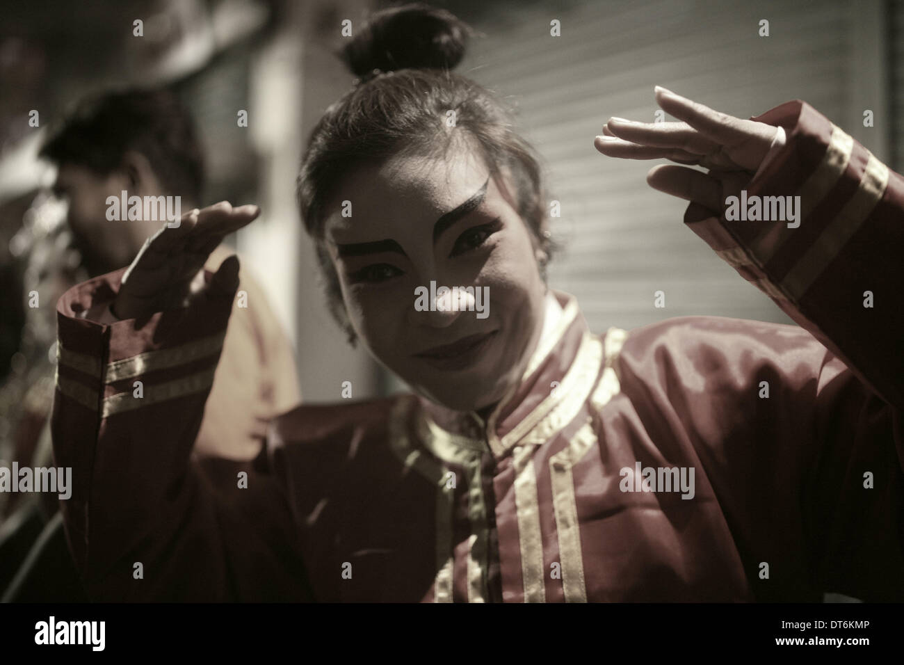 Bangkok, Thailand. 8th Feb, 2014. A Chinese Street artist backstage ...