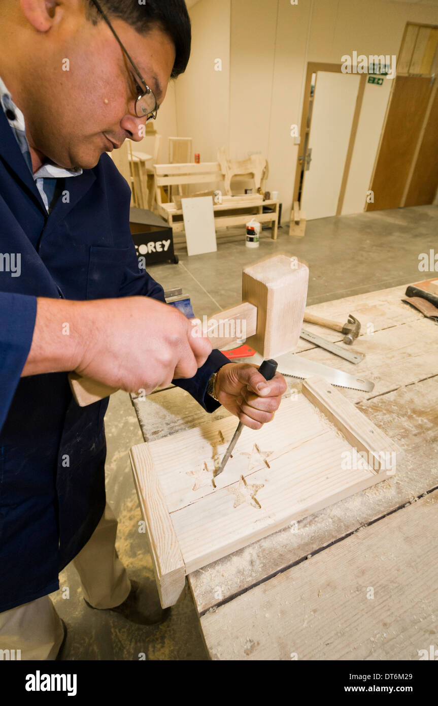 Man working in carpentry / woodwork workshop Stock Photo - Alamy