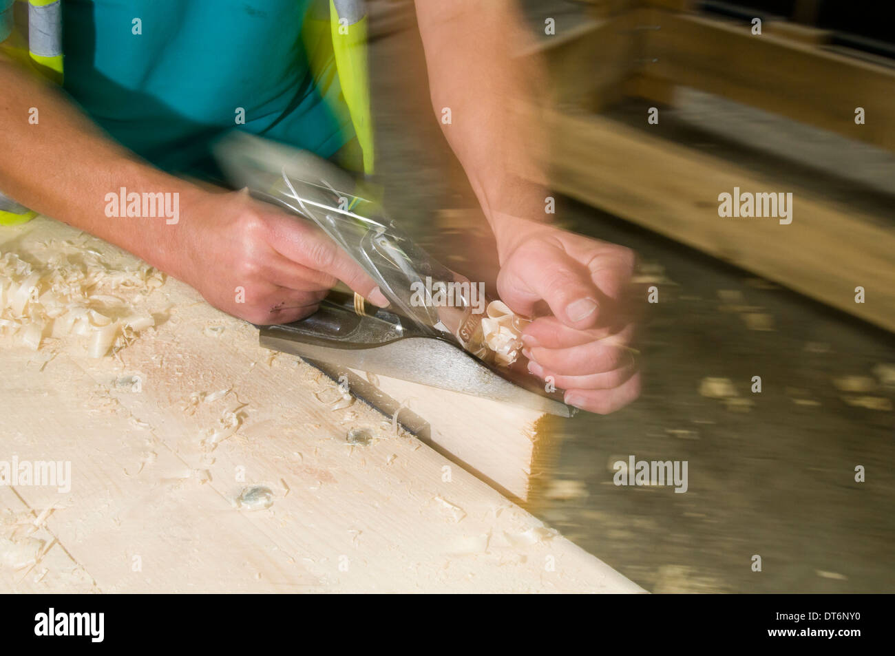 Men planing lumber hi-res stock photography and images - Alamy