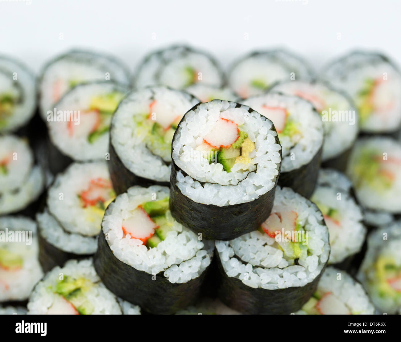 Closeup photo of Single California hand roll sushi on top of pile of ...