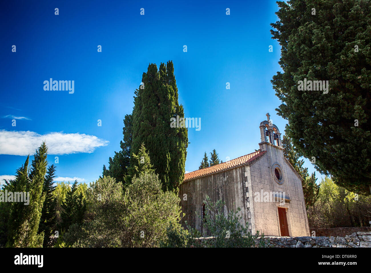 old stone rustic church and blue summer sky Stock Photo - Alamy