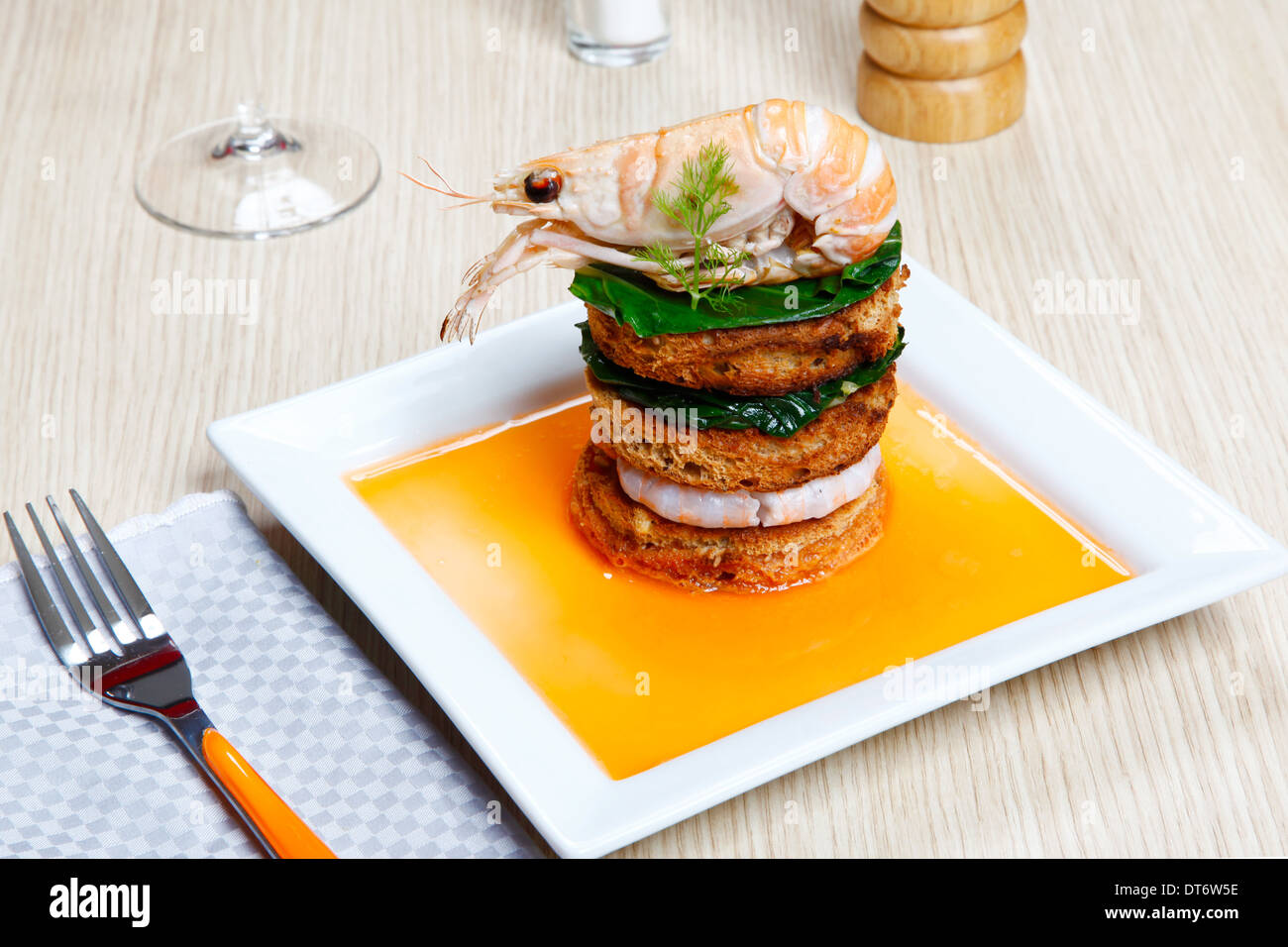 crayfish on a toast with vegetables on a dish Stock Photo - Alamy