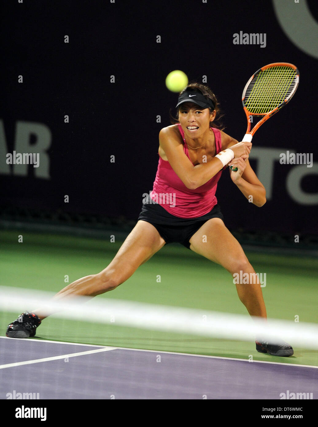 Doha, Qatar. 10th Feb, 2014. Hsien Su-Wei of Chinese Taipei hits a ...