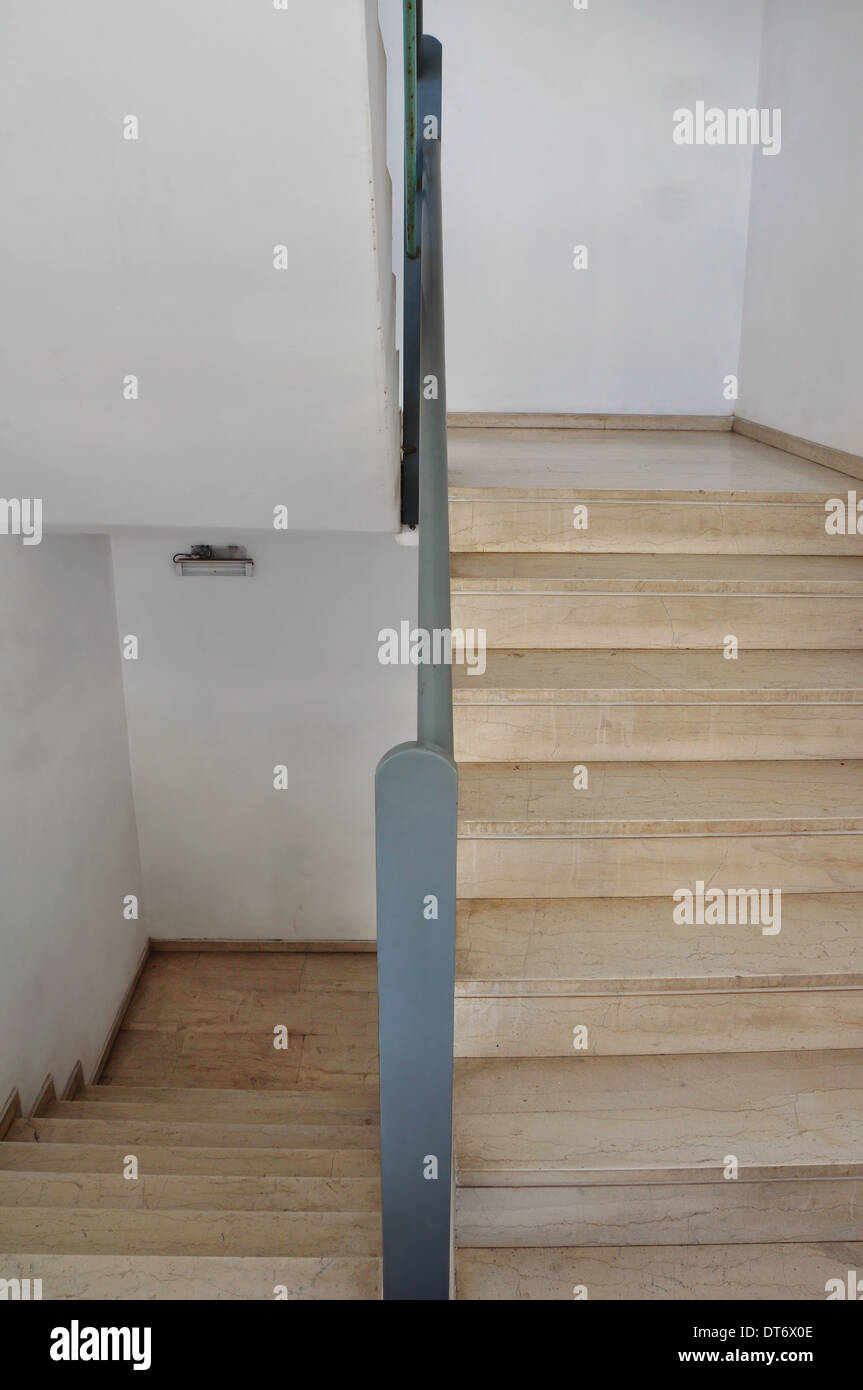 Staircase with marble steps and intermediate landing platforms between ...
