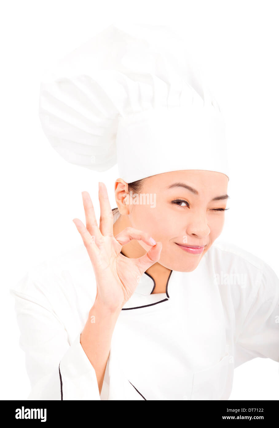Asian chef baker or cook showing ok hand sign in studio Stock Photo - Alamy