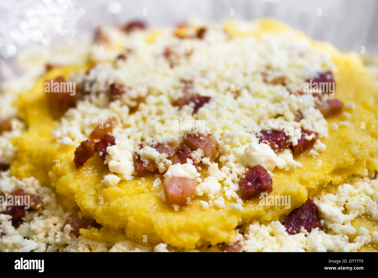 Romanian traditional plate with cheese, ham and polenta Stock Photo - Alamy