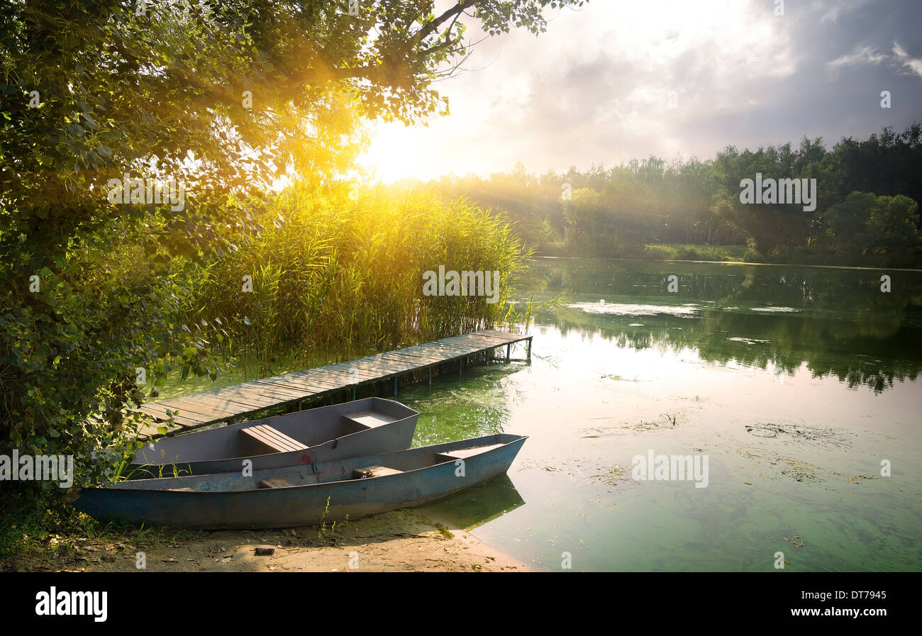 Beautiful sunset on water boats hi-res stock photography and images - Alamy