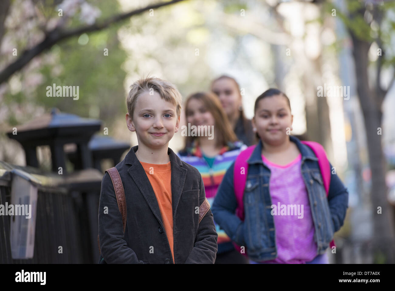 Child carrying bags hi-res stock photography and images - Alamy