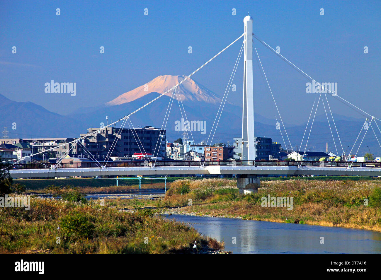Mount Fuji and Fureai-Bashi bridge on Asakawa river Hino Tokyo Japan ...