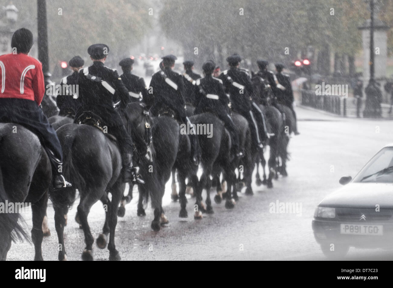 Parade by the 68 Signals Squadron riding through the torrential rain in ...