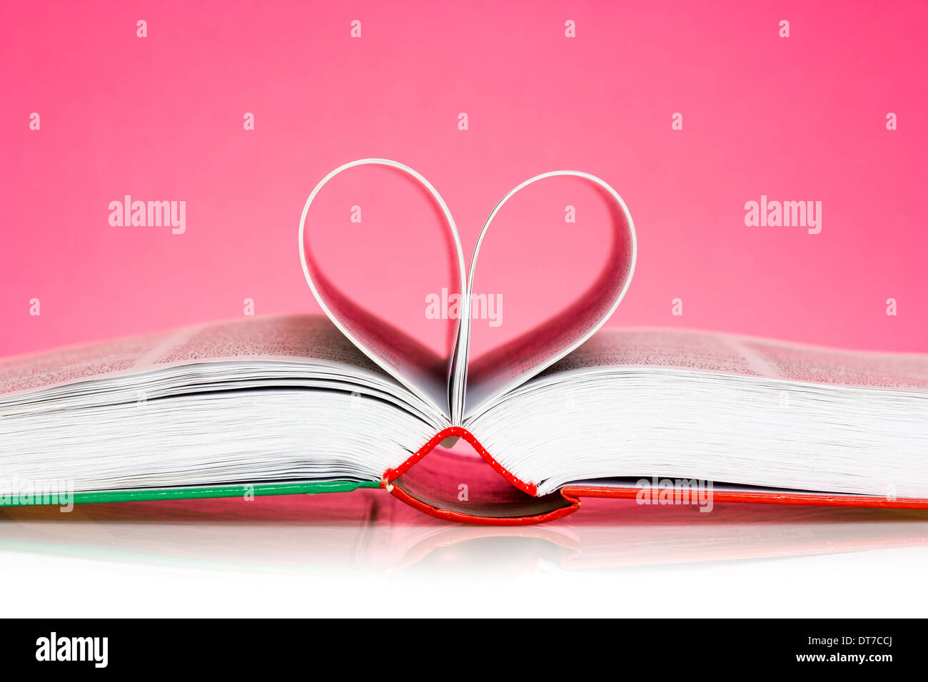 Image of pages folded into a heart shape Stock Photo - Alamy