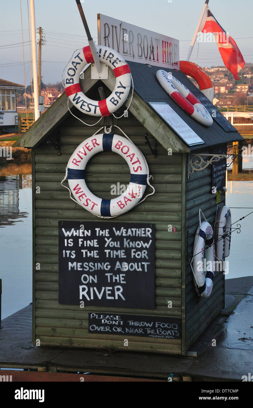 A view of a boat hiring kiosk at West Bay Dorset UK Stock Photo - Alamy
