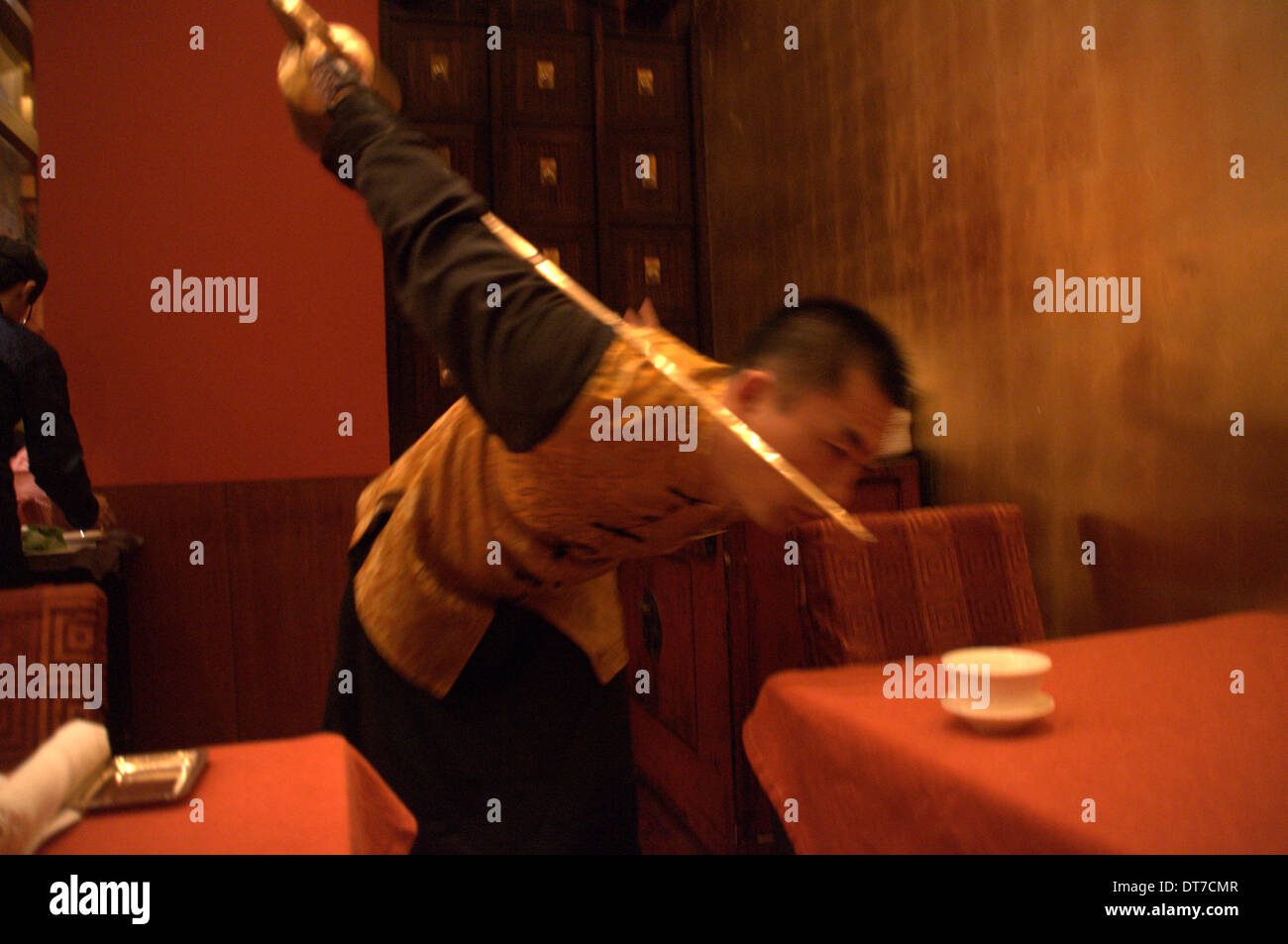 Chinese tea master pouring tea Stock Photo - Alamy