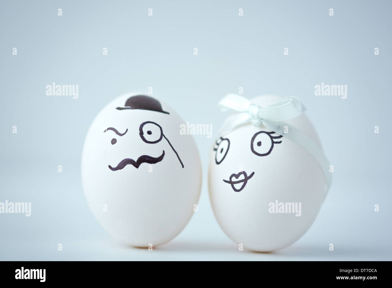 Two Easter eggs stylized as lady and gentleman Stock Photo - Alamy