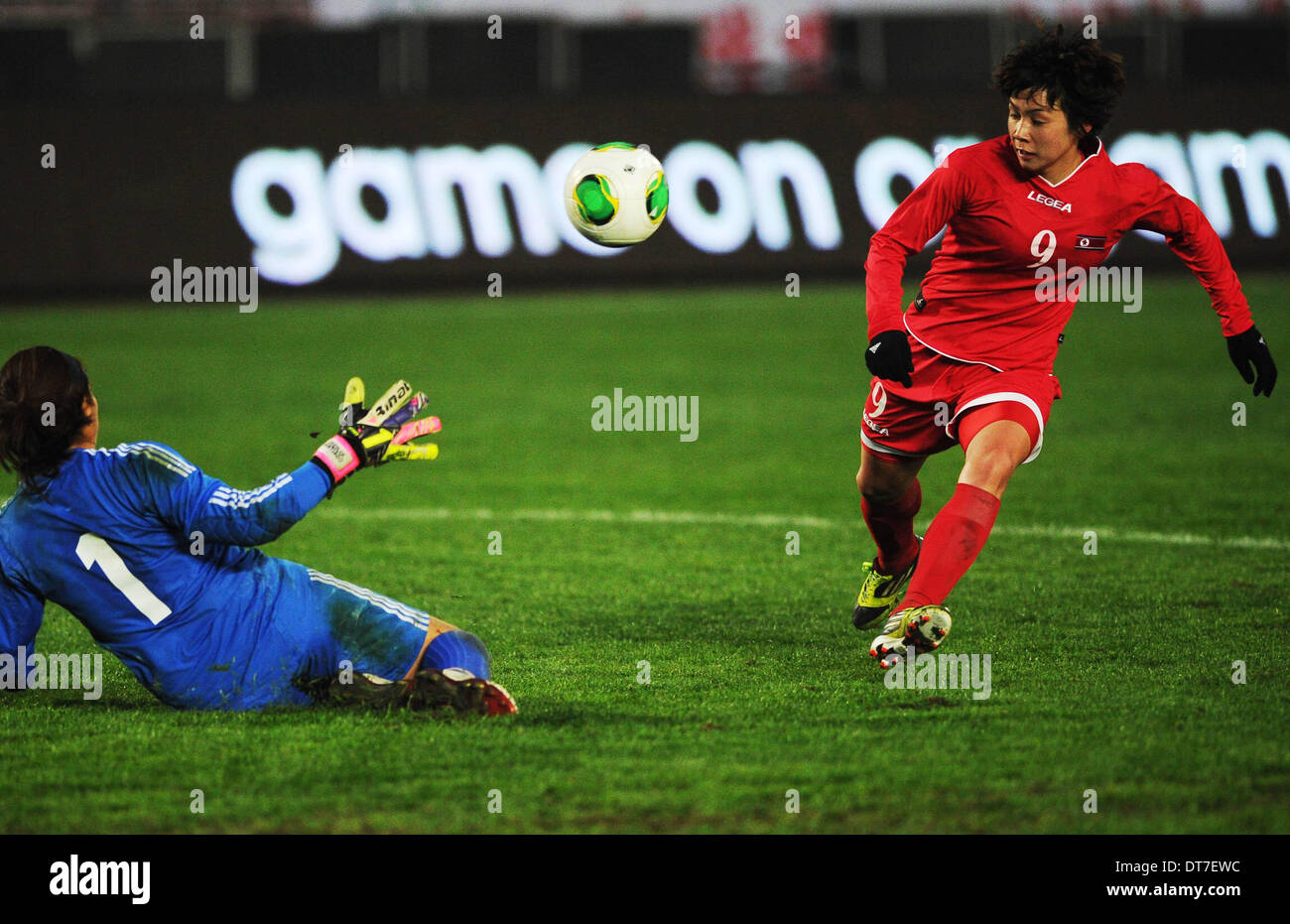 Chongqing, China. 11th Feb, 2014. Jong Yuri (R) of the Democratic ...