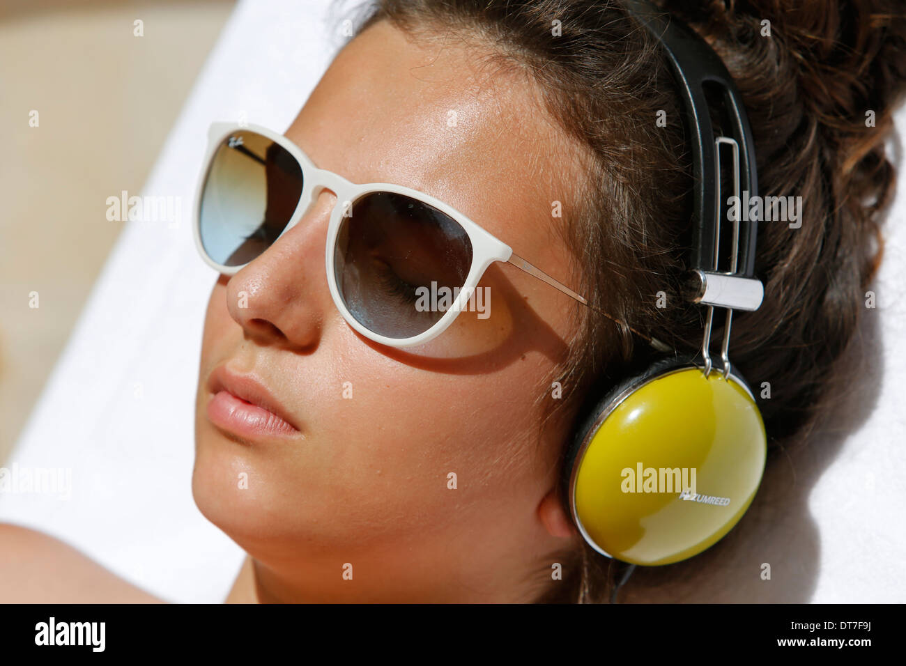 Getting a suntan getting a sun tan hi-res stock photography and images ...