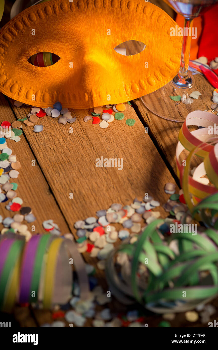Still life with carnival mask and colored glitter Stock Photo - Alamy