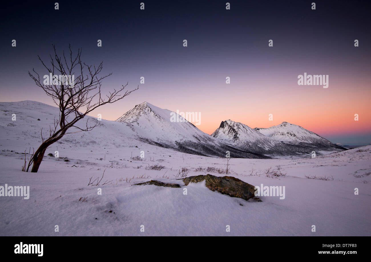 Arctic Twilight in the snow covered mountains between Tromvik and ...