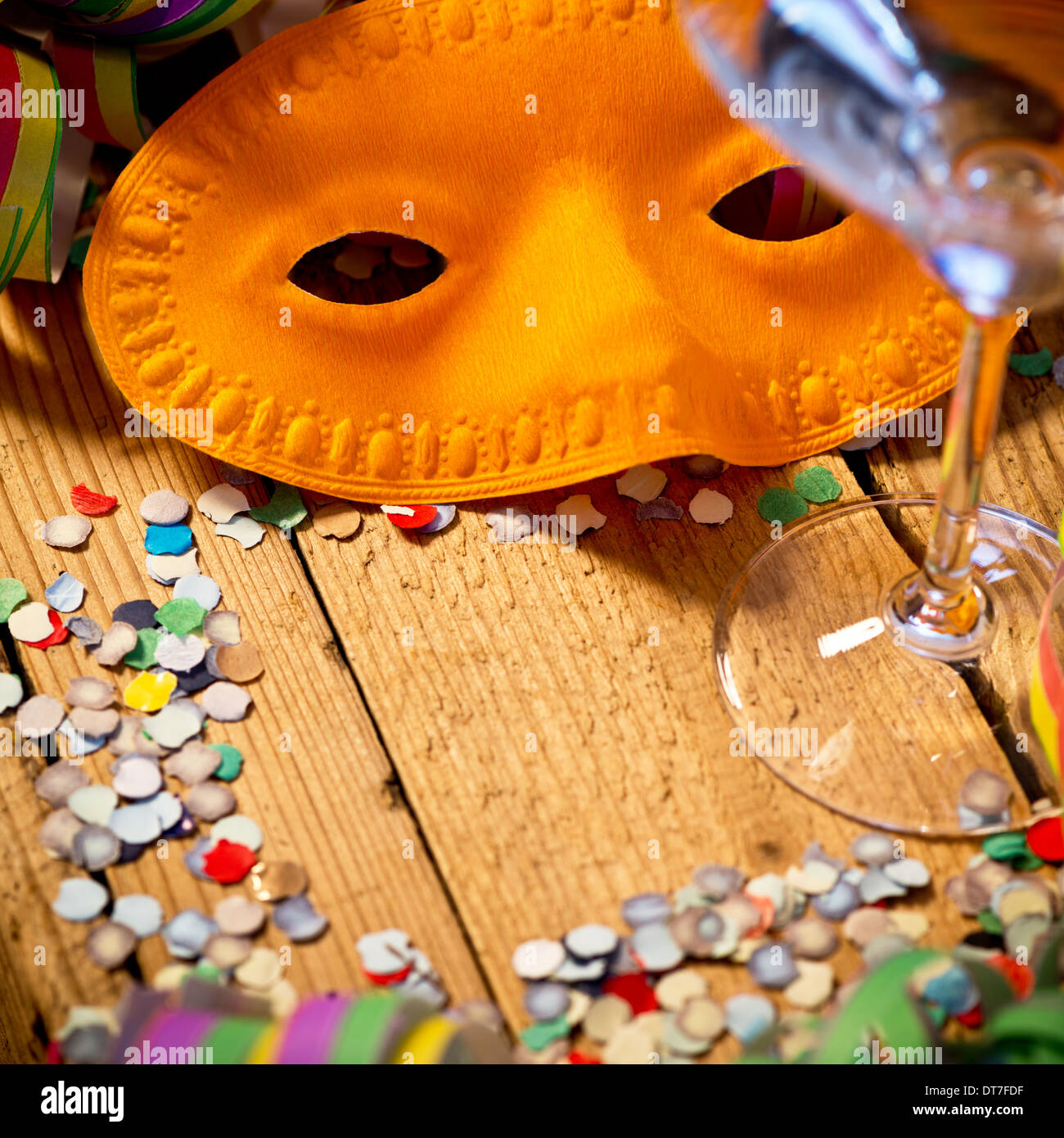 Still life with carnival mask and colored glitter Stock Photo - Alamy
