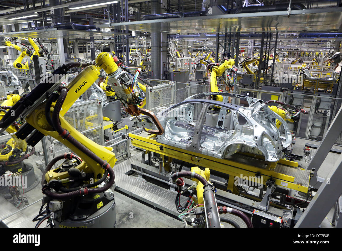 Leipzig, Germany. 05th Feb, 2014. Industrial robots manufacture the ...