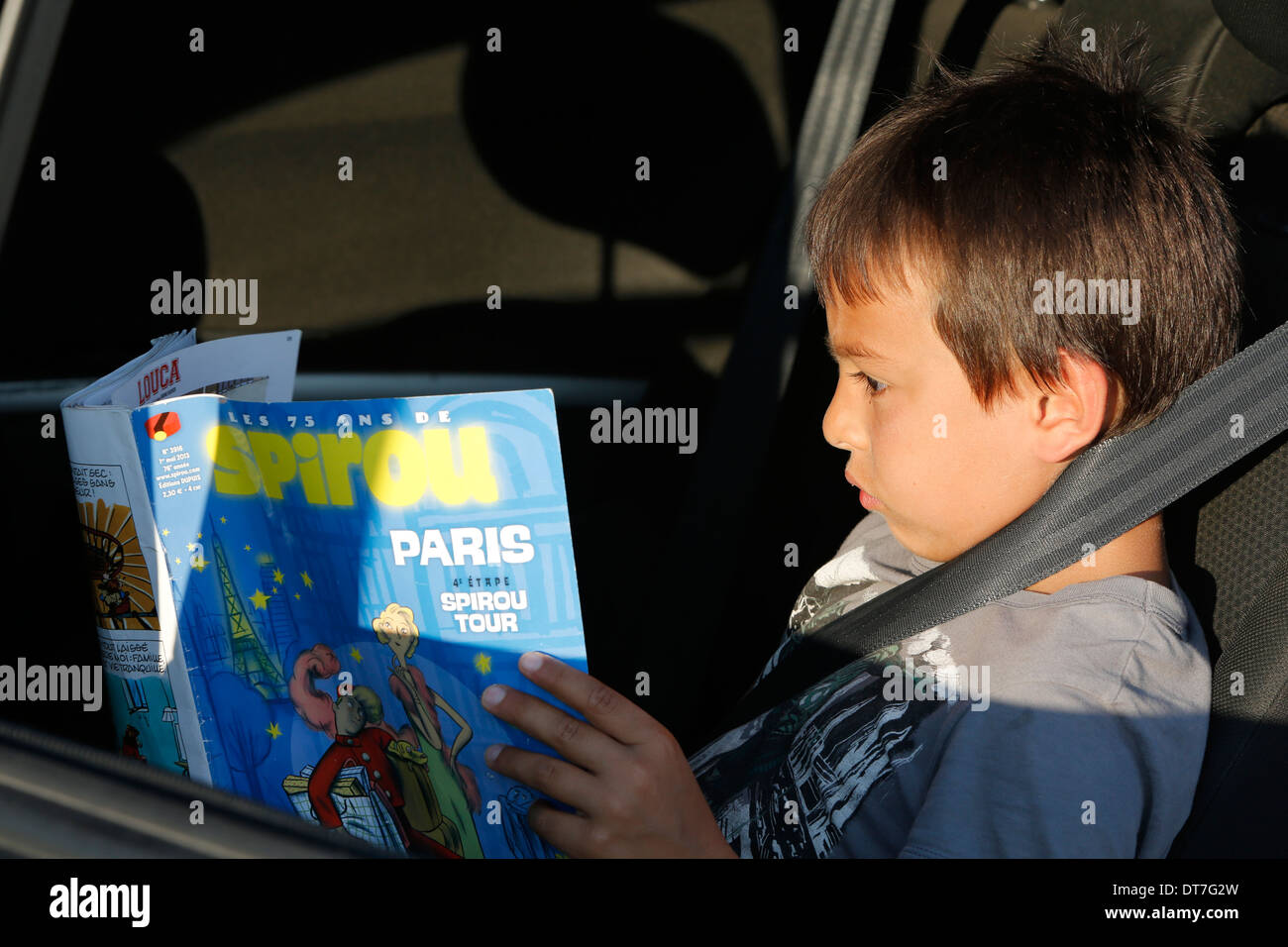 Car passenger reading a magazine hi-res stock photography and images ...