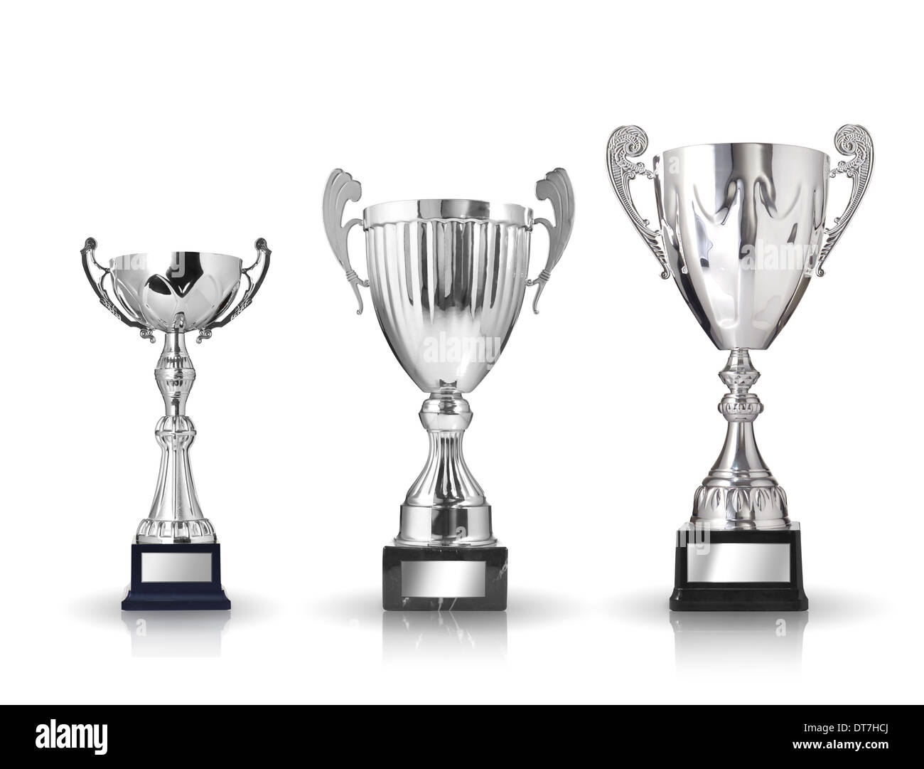 three different kind of silver trophies. Isolated on white background ...