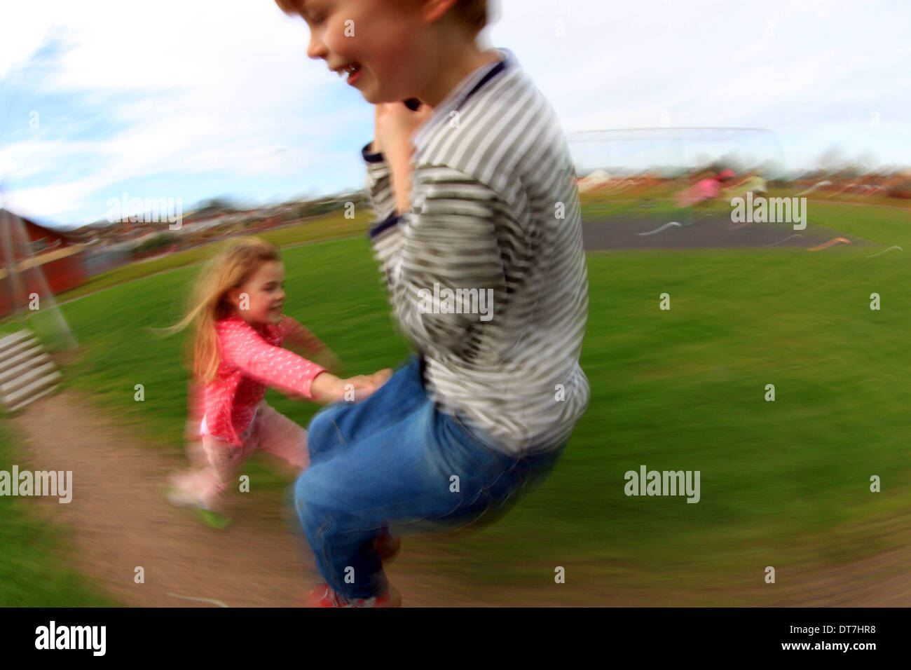 Girl on zip wire hi-res stock photography and images - Alamy