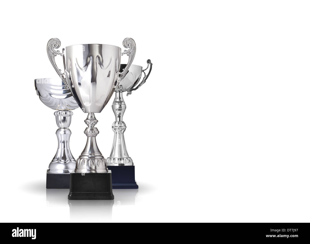three different kind of silver trophies. Isolated on white background ...