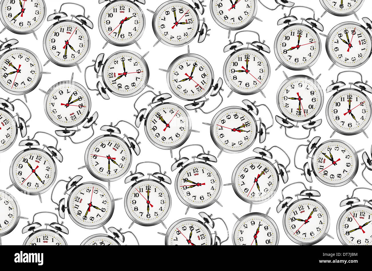 Many alarm clocks isolated on white background Stock Photo - Alamy