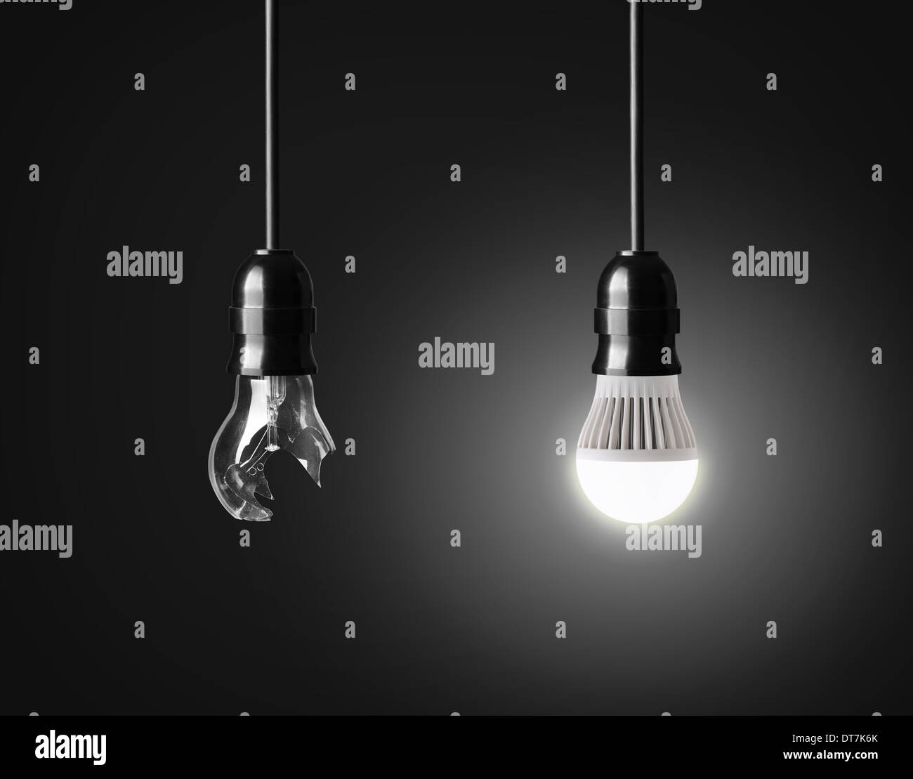 Broken light bulb and glowing LED bulb on black Stock Photo - Alamy