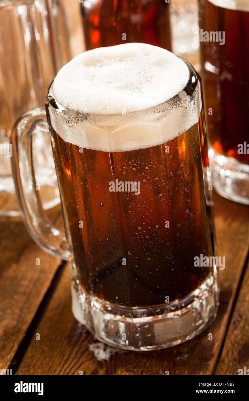 Cold Refreshing Root Beer with Foam in a Mug Stock Photo - Alamy