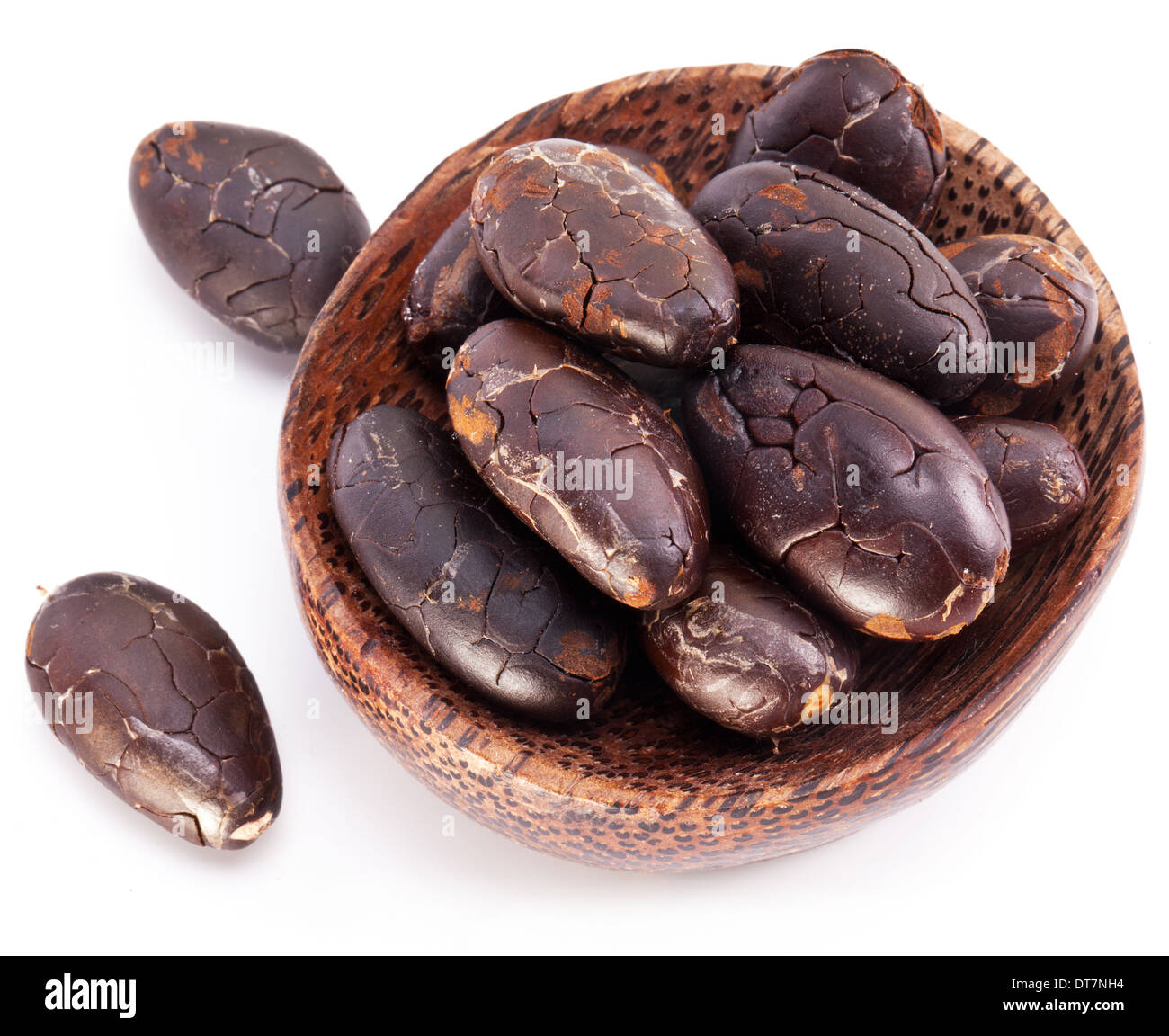 Cocoa beans on a white background Stock Photo - Alamy