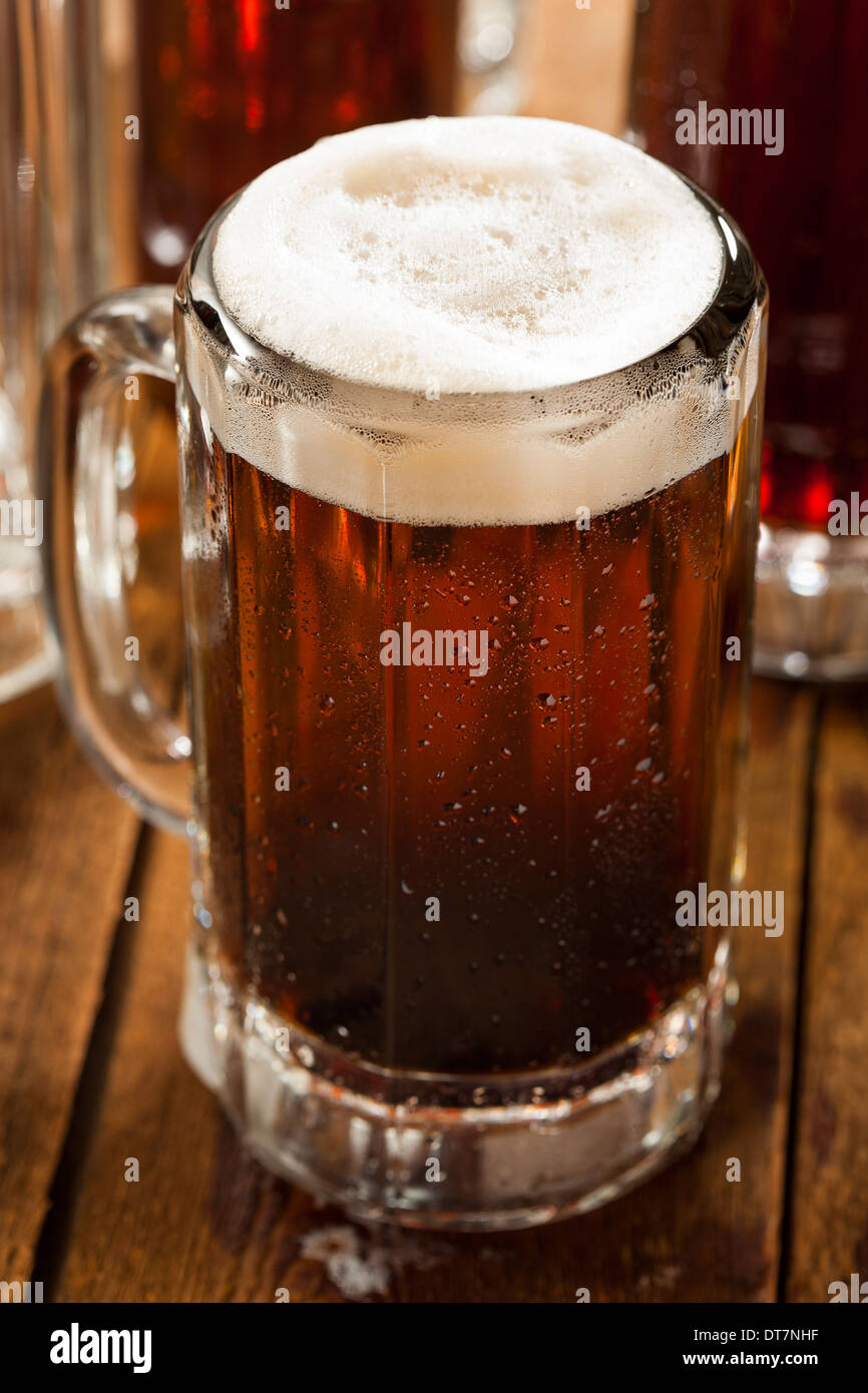 Cold Refreshing Root Beer with Foam in a Mug Stock Photo - Alamy