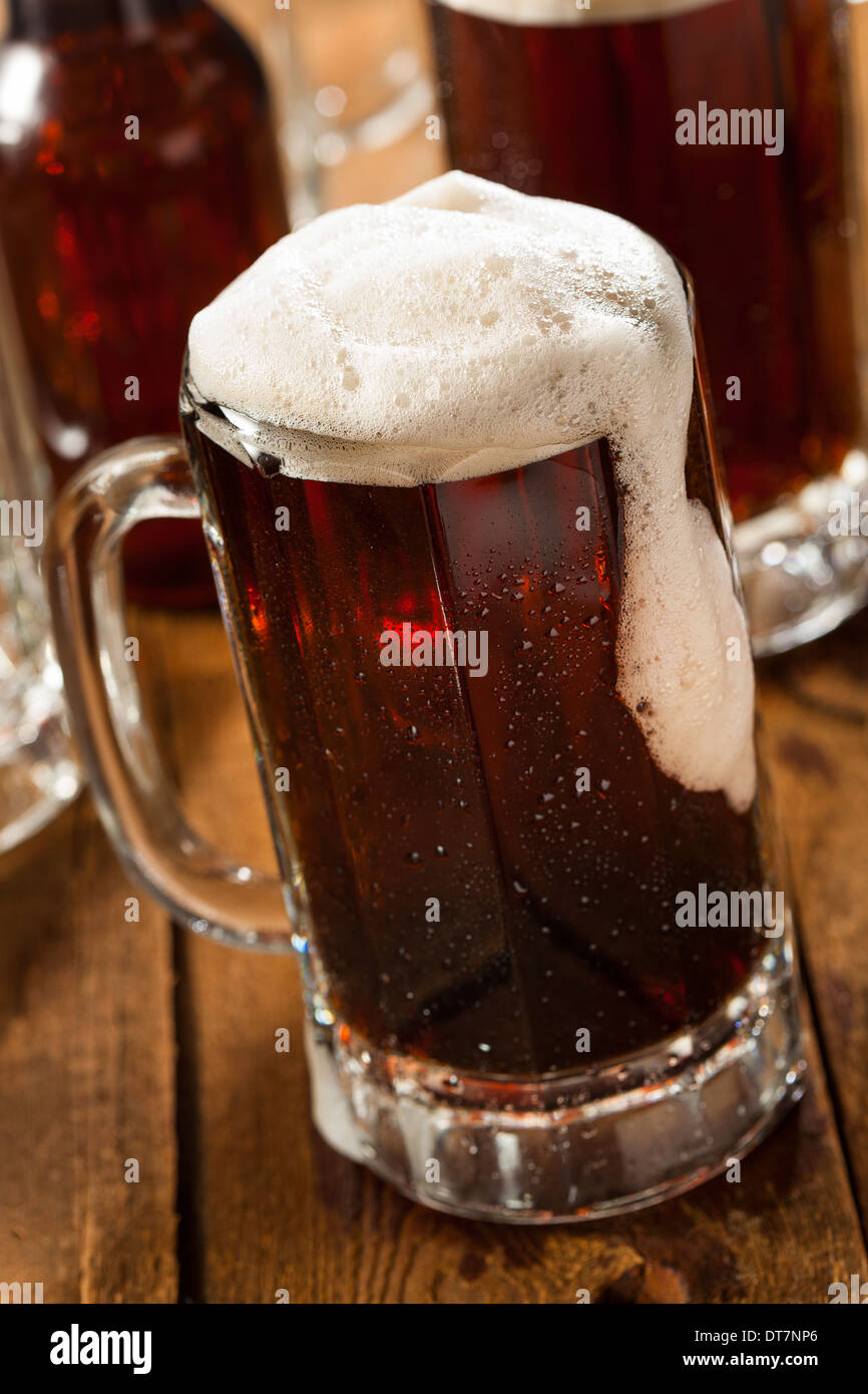 Cold Refreshing Root Beer with Foam in a Mug Stock Photo - Alamy
