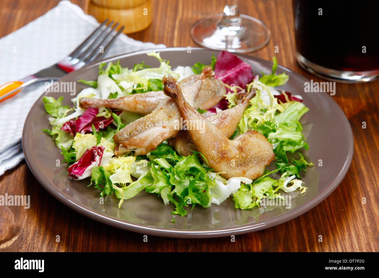 cooked quail and vegetables in a dish Stock Photo - Alamy
