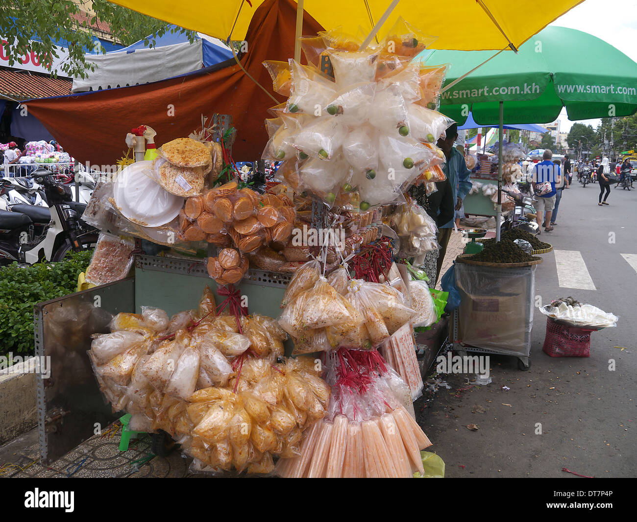 Vietnamese sweets for sale in street in Vietnam Stock Photo - Alamy