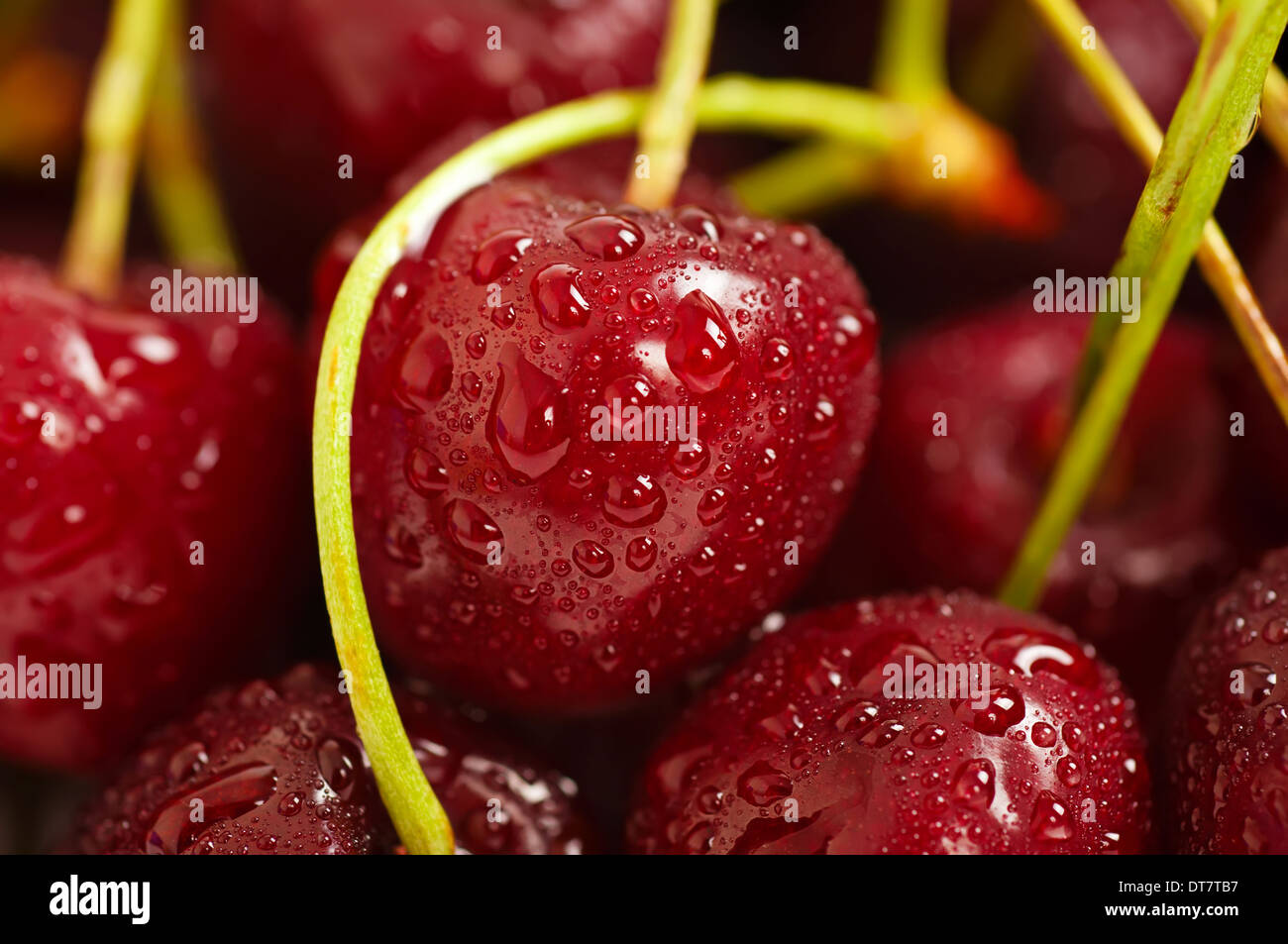 Sweet cherry background Stock Photo - Alamy