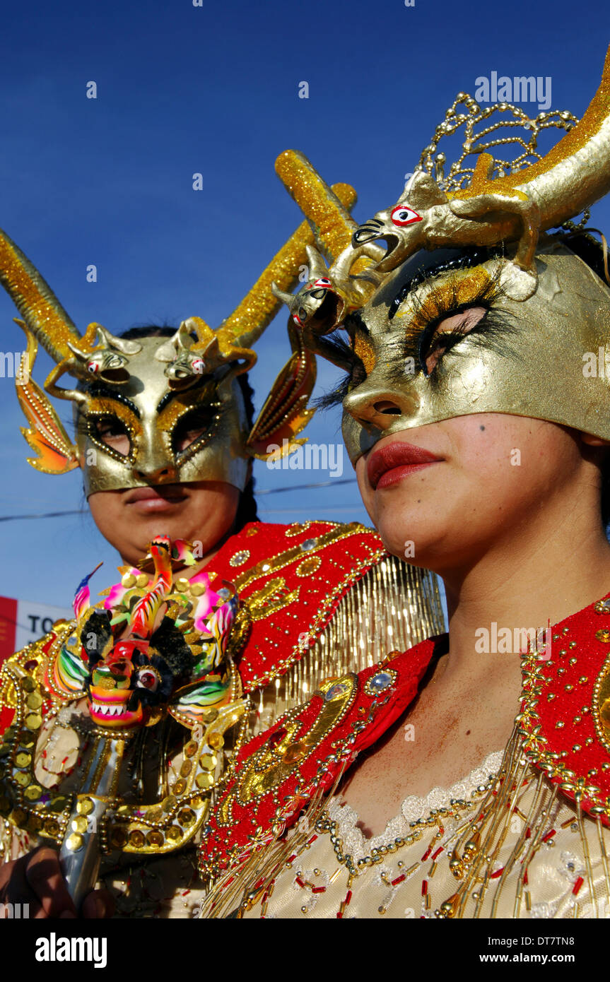 Participants diablada dancing, dance that represents fighting between ...