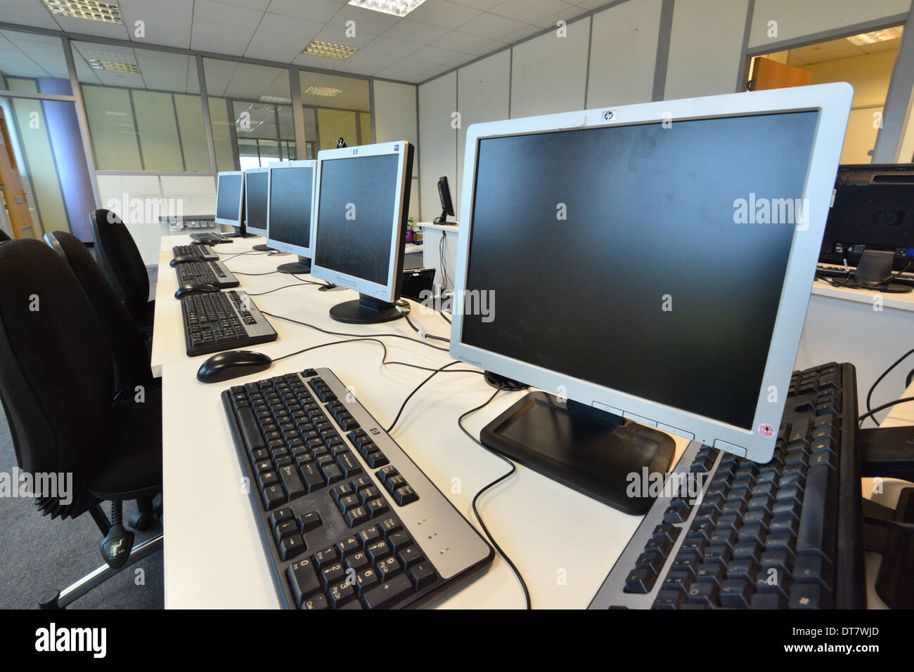 A row of computers in a training office at London, Gatwick Stock Photo ...