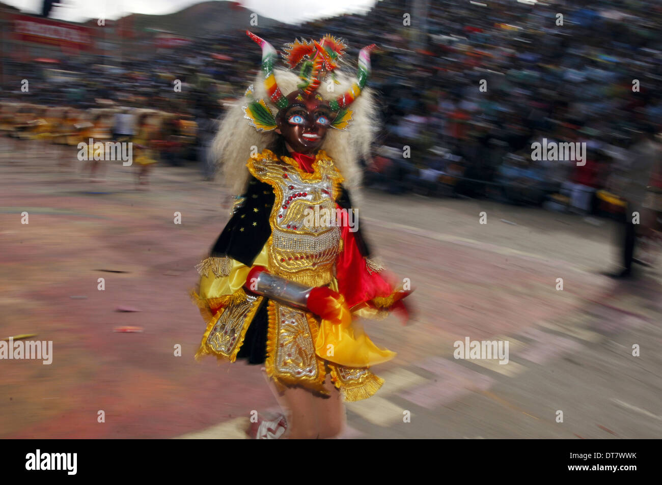Participants diablada dancing, dance that represents fighting between ...