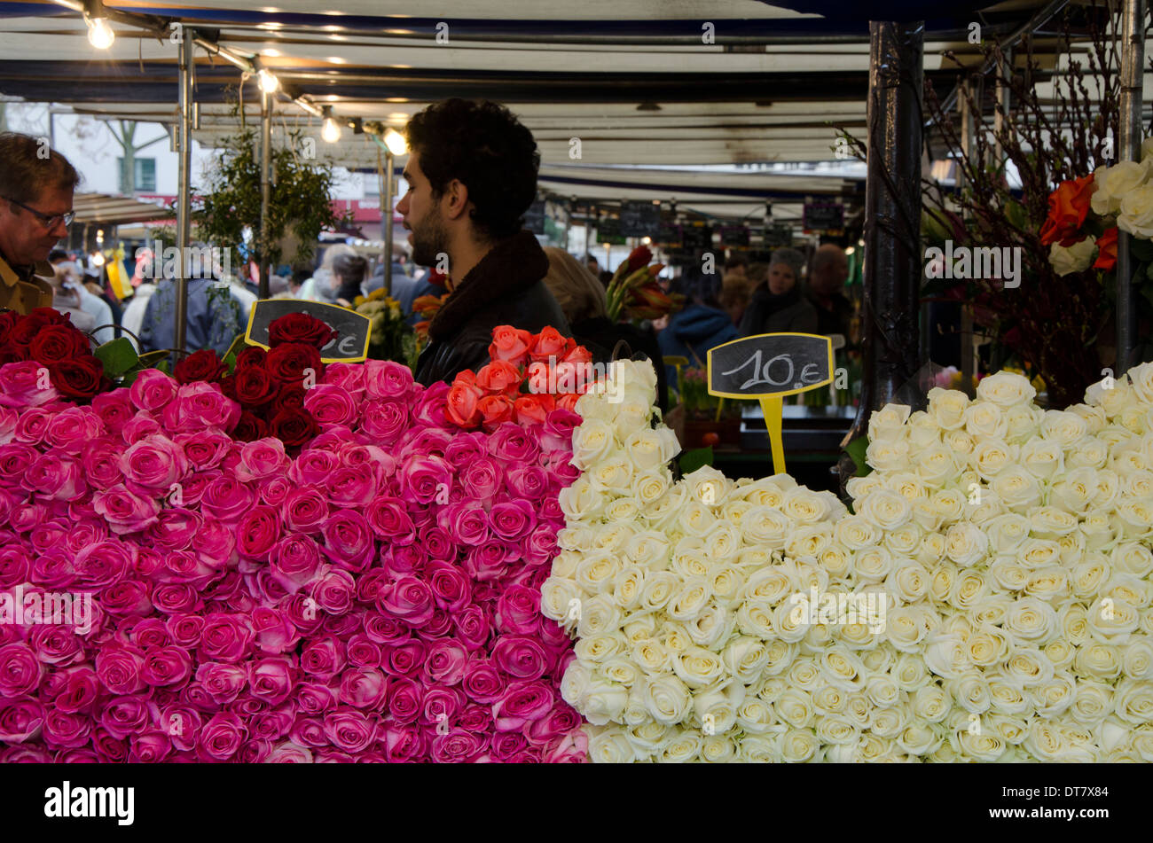 Flower stall with roses on display at the market at place d'aligre, a ...