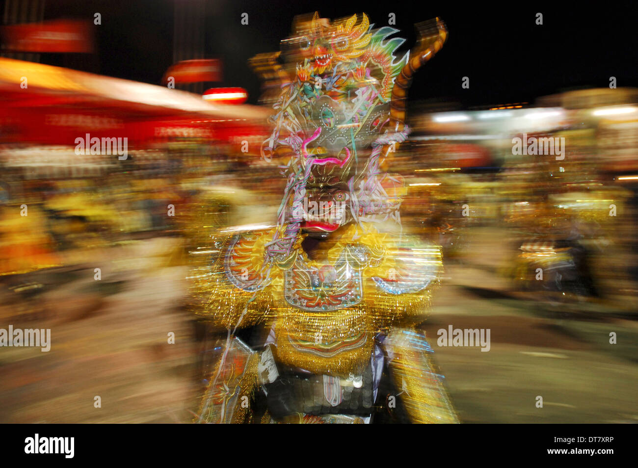 Participants diablada dancing, dance that represents fighting between ...