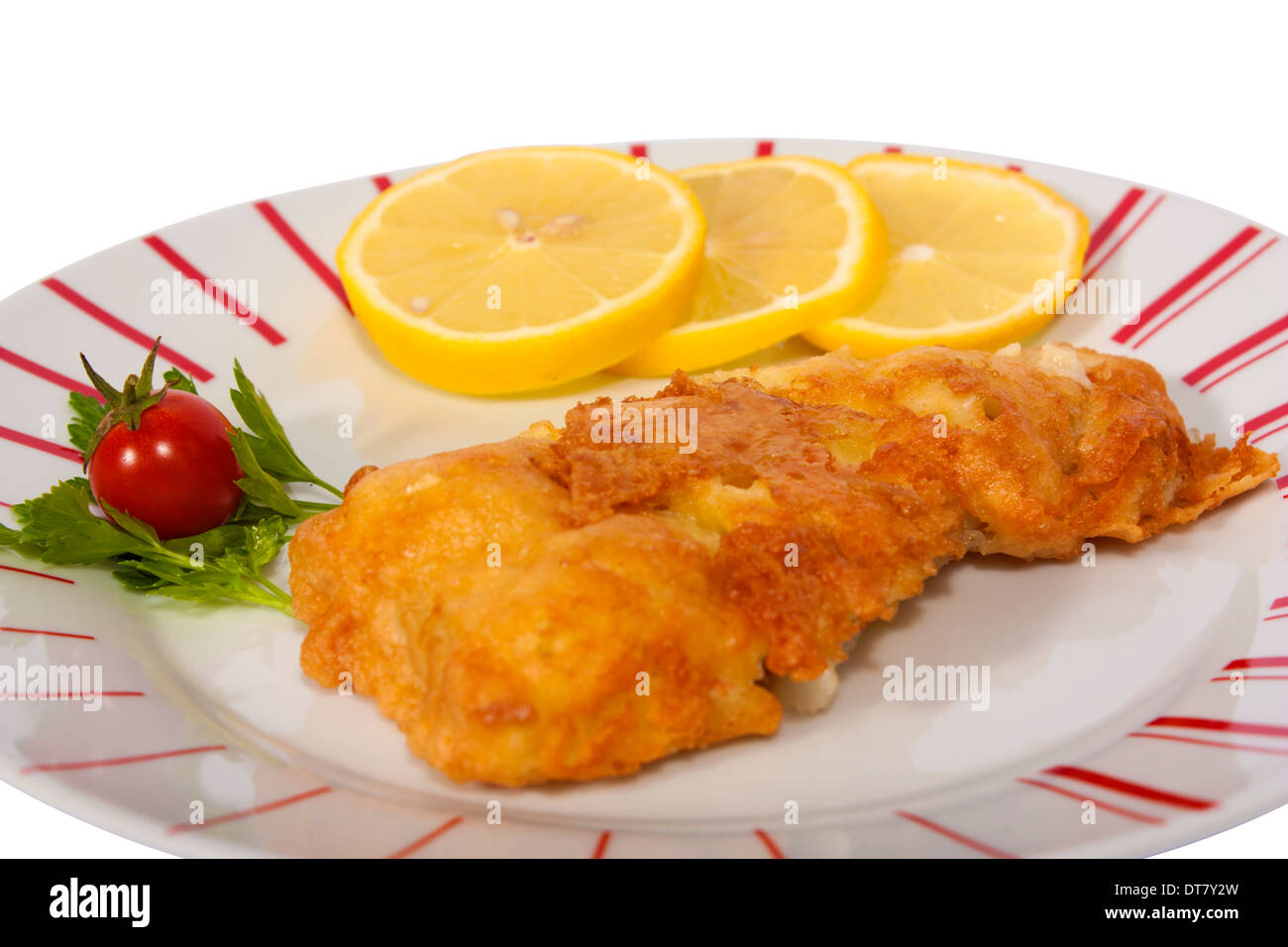 Fish schnitzel with lemon on a plate isolated on white background Stock ...