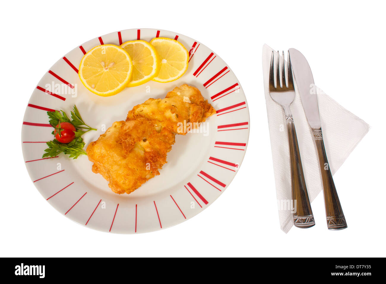 Fish schnitzel with lemon on a plate isolated on white background Stock ...