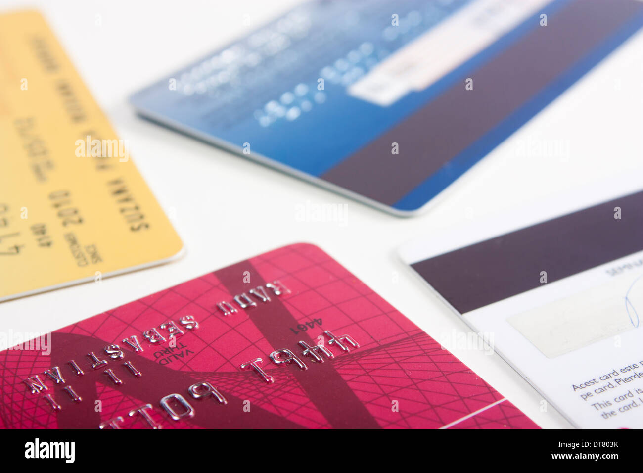 Different type of credit cards over white background Stock Photo - Alamy