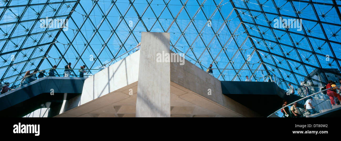 Louvre. Access under the pyramidal dome Stock Photo - Alamy