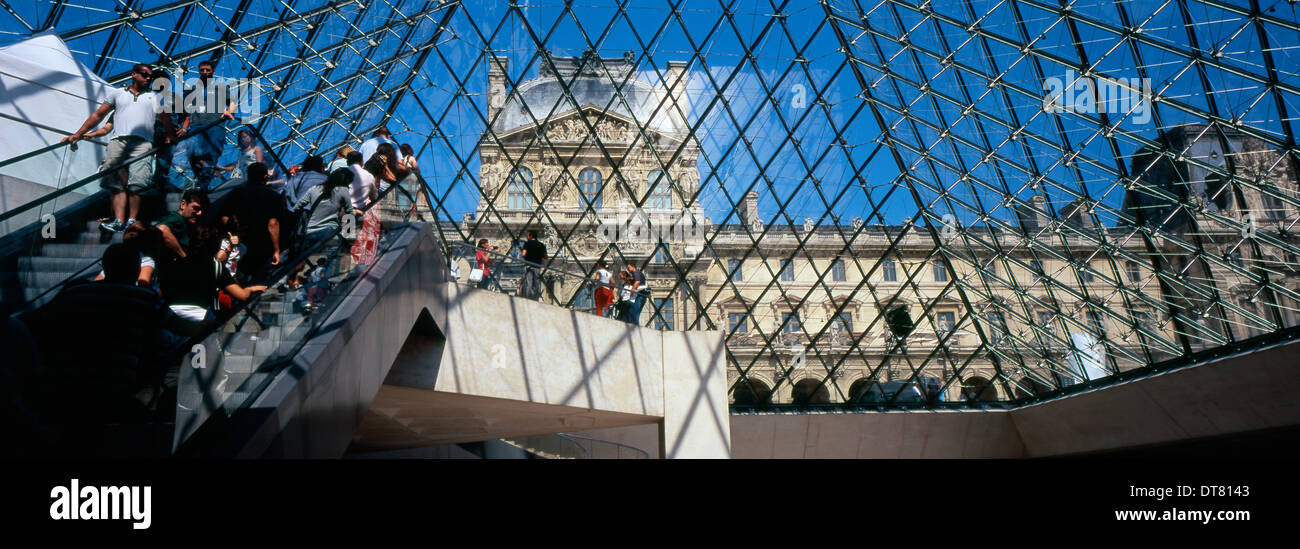 Louvre. Access under the pyramidal dome Stock Photo - Alamy