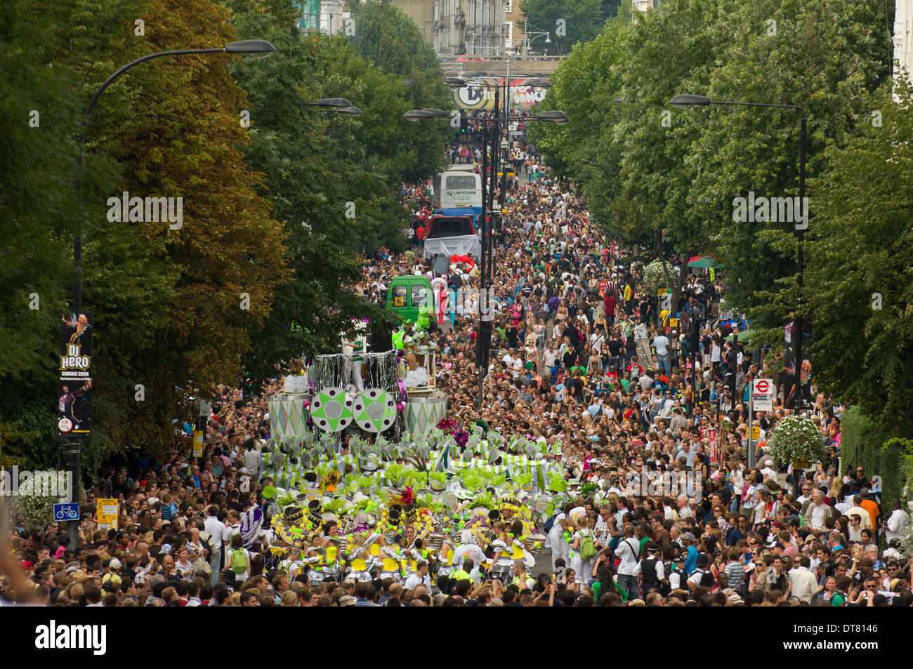 Vast crowds lining Ladbroke Grove watching the ornate floats of the ...